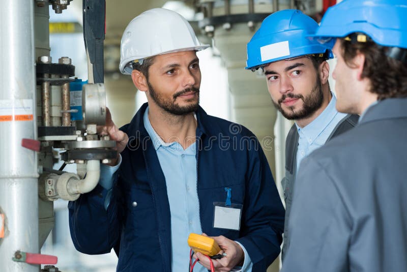 Three Men Discussing Future Wind Power Station Project Stock Photo ...