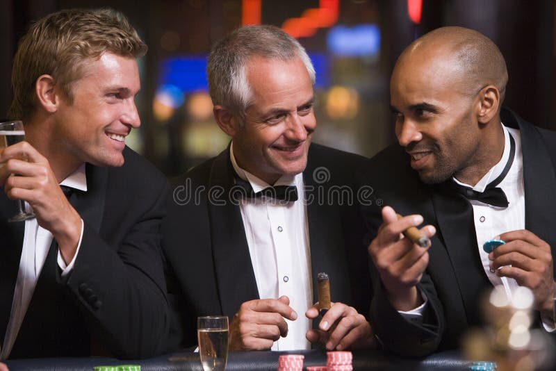 Three Men Gambling at Roulette Table Stock Photo - Image of casino ...