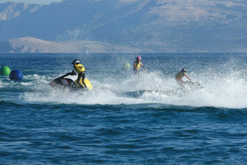 Three men on jet ski stock image. Image of protection - 2950035