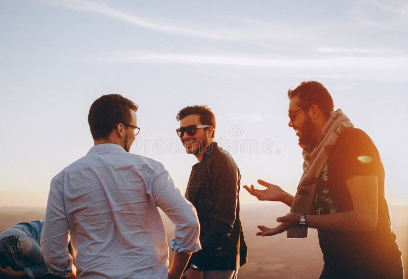 Three Men Standing While Laughing Stock Image - Image of friends ...