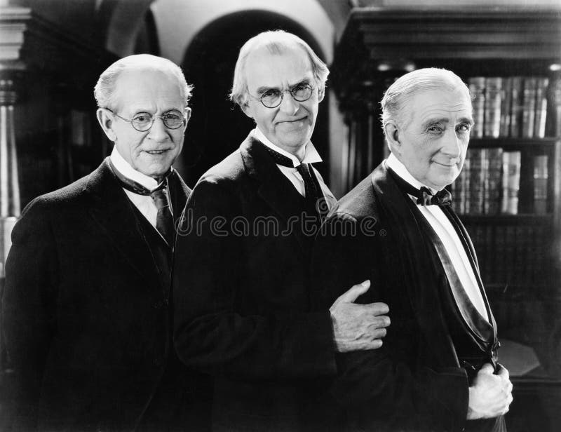 Three Men Standing Together Stock Photo - Image of hair, historical ...