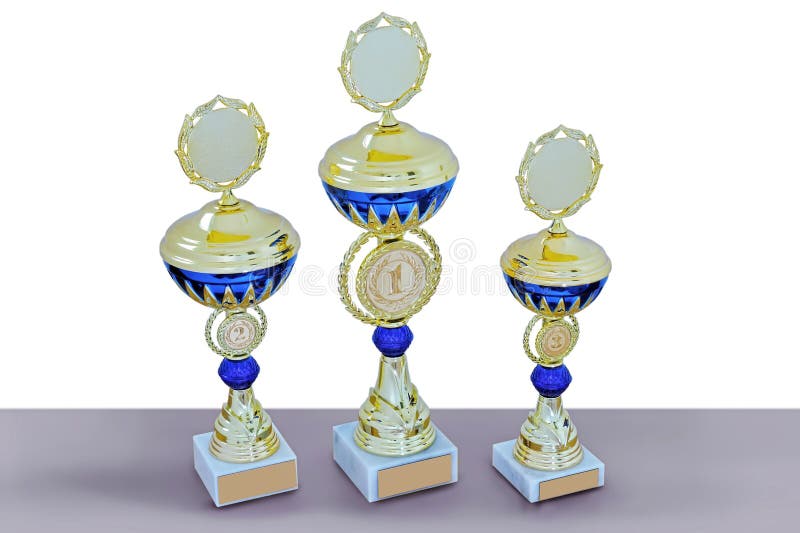 Three Metal Cups of Gold Color with Blue Details Stock Photo - Image of ...