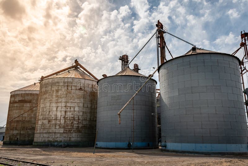 Three Metal Tanks for Storage of Grains Stock Image - Image of ...
