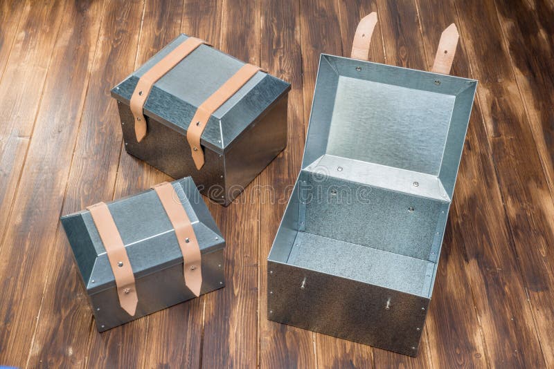 Three Metal Tool Box on Wooden Table Stock Image - Image of chrome ...