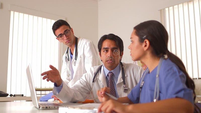 Three Mexican Doctors Working in the Office Stock Video - Video of ...