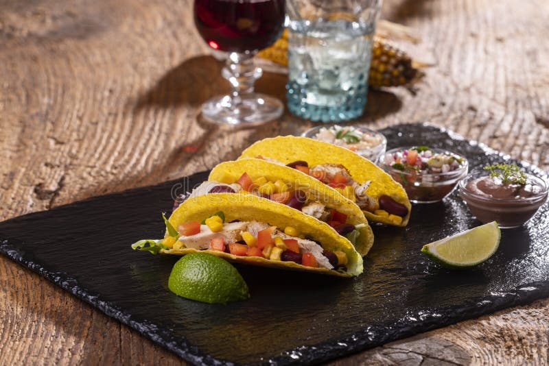 Three mexican tacos stock photo. Image of refritos, pork - 160865470