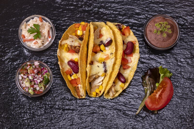 Three mexican tacos stock image. Image of dish, salsa - 194233587