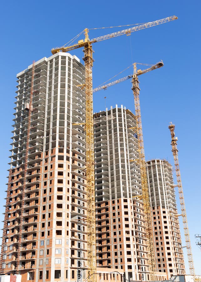 Three Modern High-rise Panel New Building Under Construction and Three ...