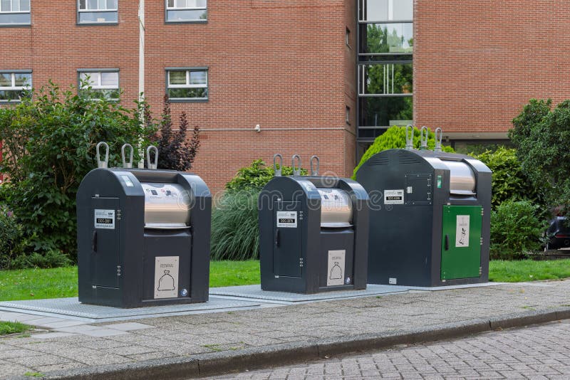 Three Modern Underground Waste Containers. Stock Photo - Image of ...
