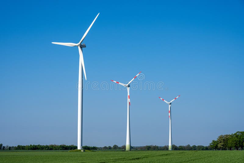 Three modern wind turbines stock image. Image of electric - 282890325