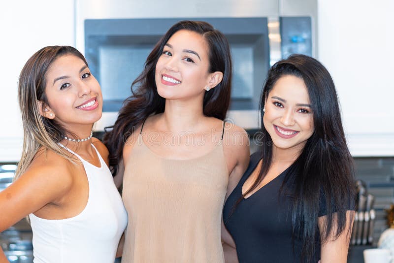 Three Moms in the Kitchen stock image. Image of motherhood - 140347867