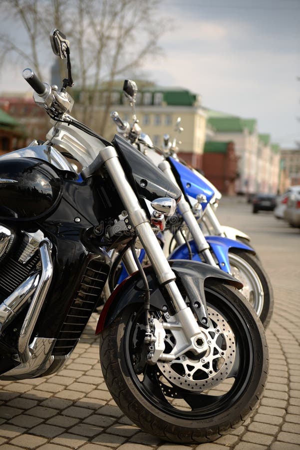 Three motorcycles editorial stock photo. Image of white - 40345868