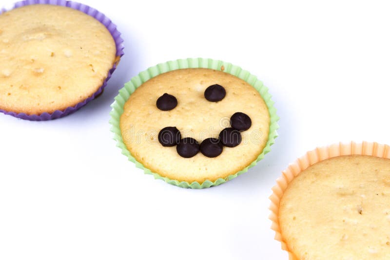 Three muffins stock image. Image of face, fast, dessert - 32397639