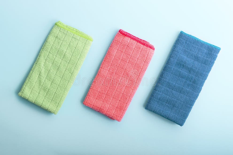 Three Multi-colored Microfiber Rags on Blue Background, Concert ...
