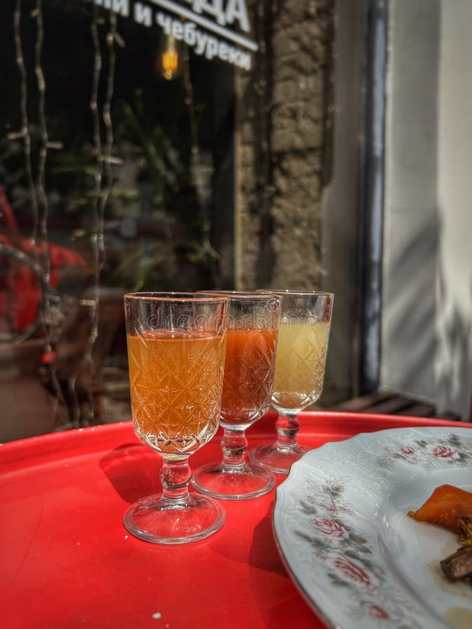 Three Multi-colored Tinctures in Glasses Stock Photo - Image of ...