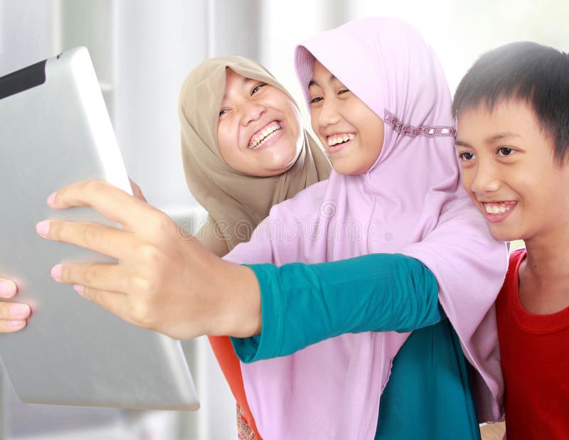 Three Kids Playing Tablet Computer Stock Image - Image of child, family ...