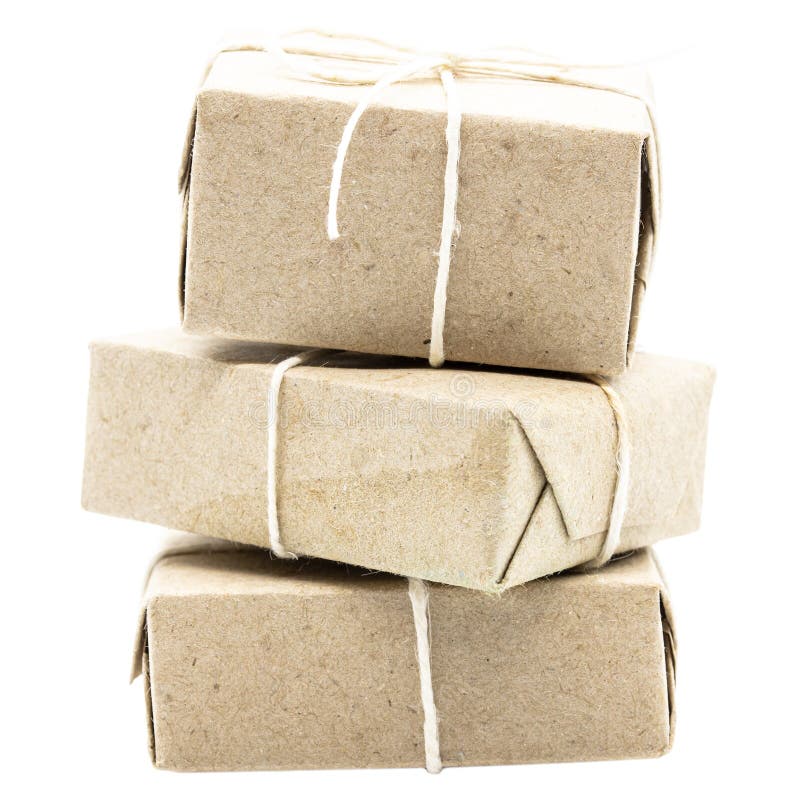 Three Natural Brown Gift Boxes or Parcels with Cord Ribbon Stock Photo ...
