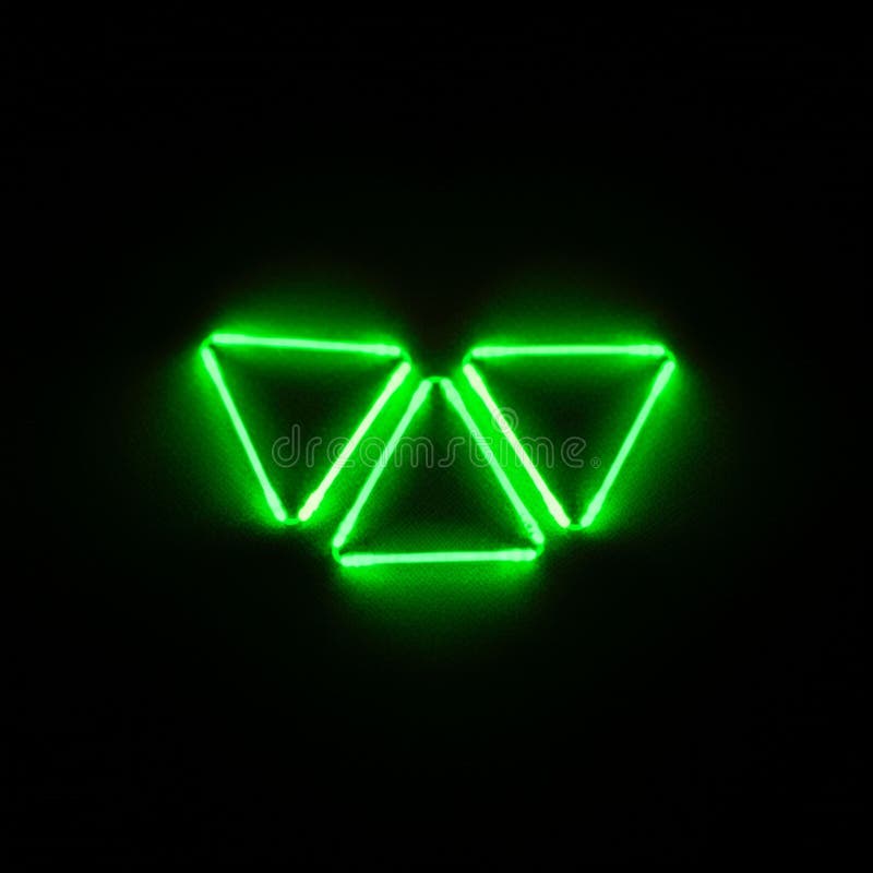 Three Neon Green Triangles Arranged Side by Side Against a Black ...