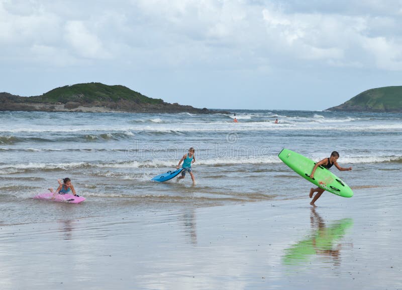 Three Nipper Surfer Life Savers Leave Water Editorial Image - Image of ...