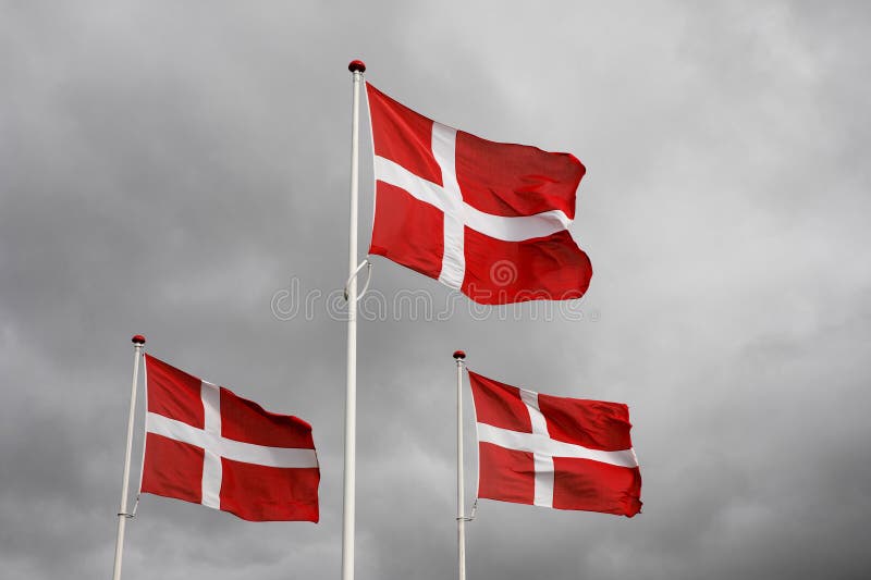 Three Official Denmark Flags Waving on the Wind. Stock Image - Image of ...