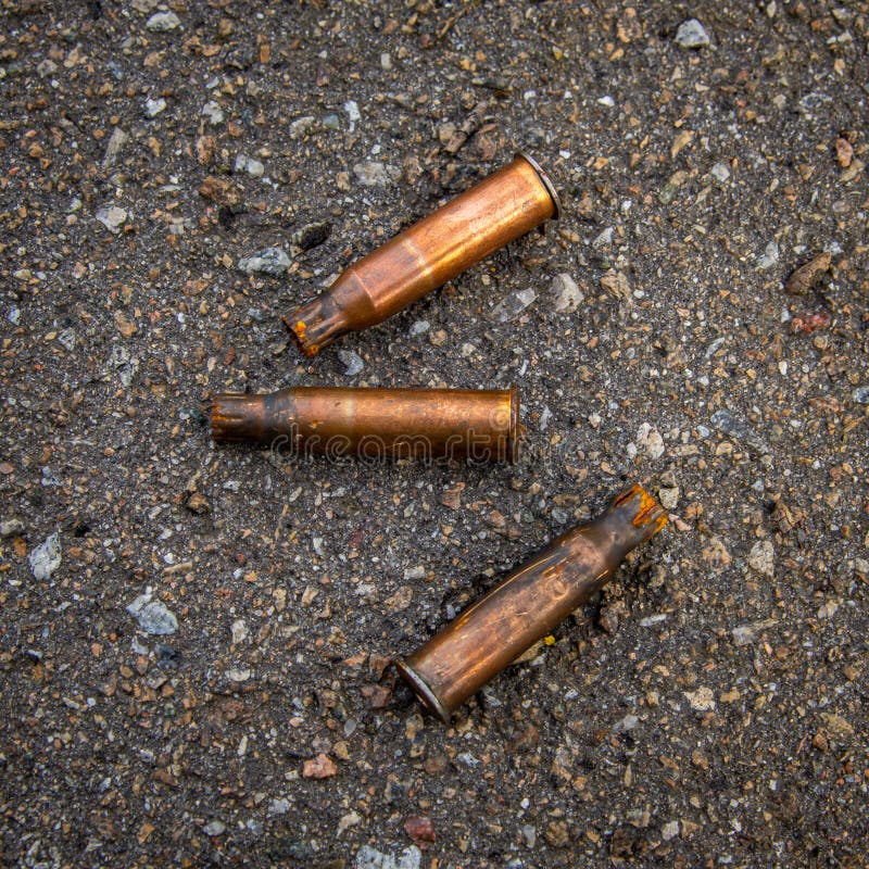 Three Old Brown Bullet Casings Stock Image - Image of ammo, caliber ...