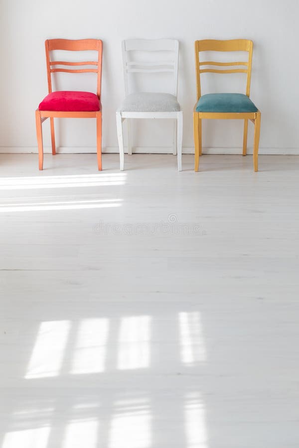 Three Old Different Chairs in the Interior of a White Room Stock Image ...