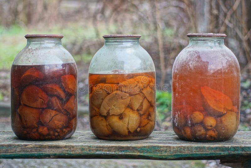 Three Old Gray Jars Full of Pear and Apple Compote Stock Photo - Image ...