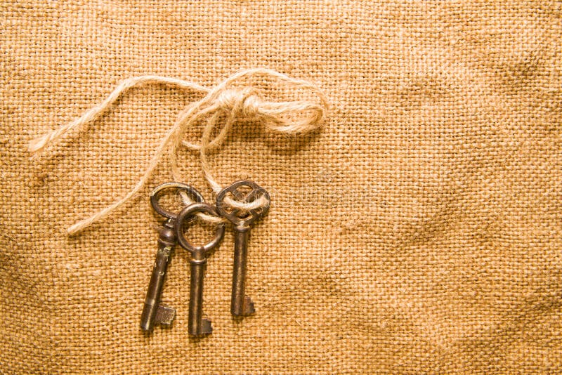 Three Old Keys Tied with a Rope on a White Background Stock Photo ...