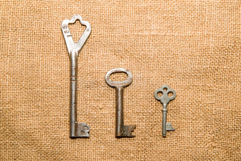 Three Old Keys To the Safe on a Very Old Cloth Stock Photo - Image of ...