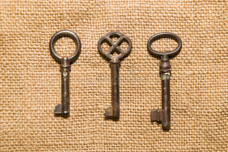 Three Old Keys Tied with a Rope on a White Background Stock Photo ...