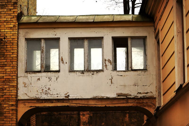 Three Old Rusty Windows in White Corridor Bridging Buildings Stock ...