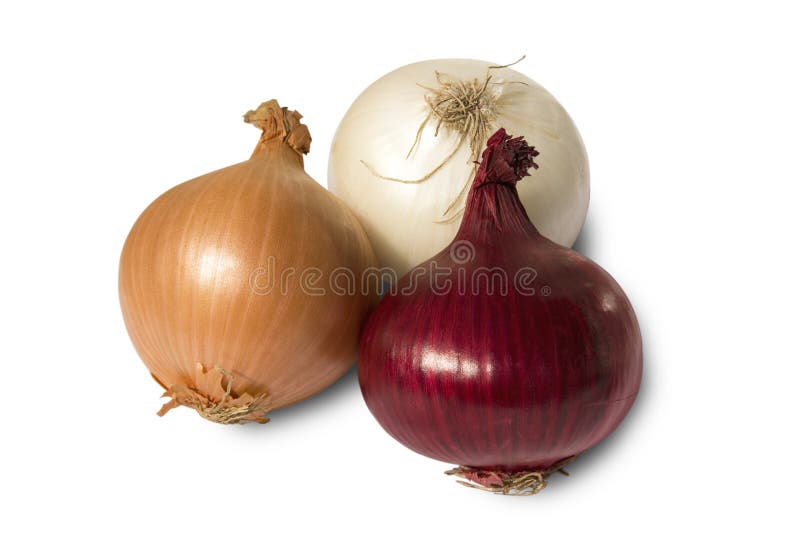 Three Onions on Violet Background Stock Photo - Image of green ...