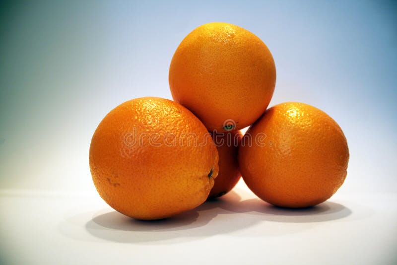Three oranges stock image. Image of wallpaper, nutritiously - 71407443