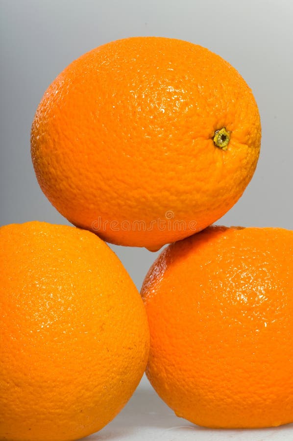Three Oranges Lying on the Ground Stock Image - Image of water, food ...