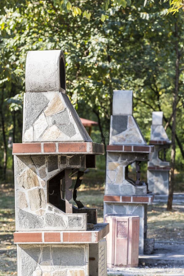 Three outdoor barbeques stock image. Image of three, chimney - 80390127
