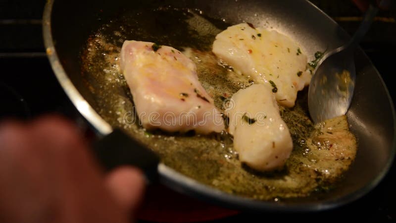 Three pan-fried cod steaks stock footage. Video of kitchen - 186904502