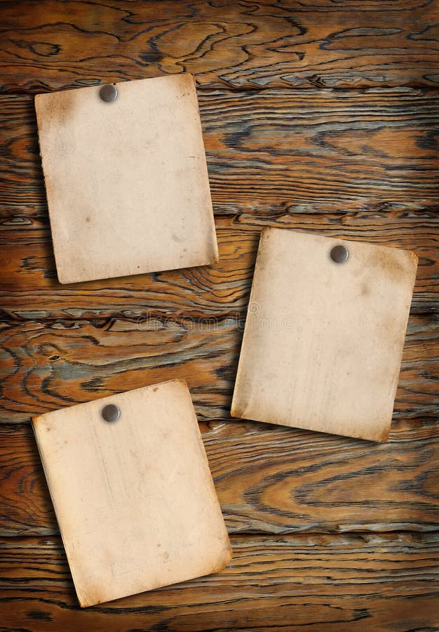 Three Paper Poster on a Wood Wall Stock Photo - Image of nostalgia ...