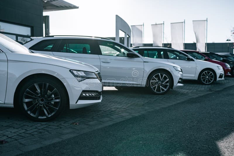 Parked White Cars in a Station Stock Photo - Image of automobile, motor ...