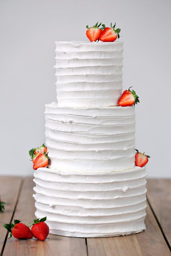 Three Parts Naked Wedding Cake with Strawberries Stock Photo - Image of ...