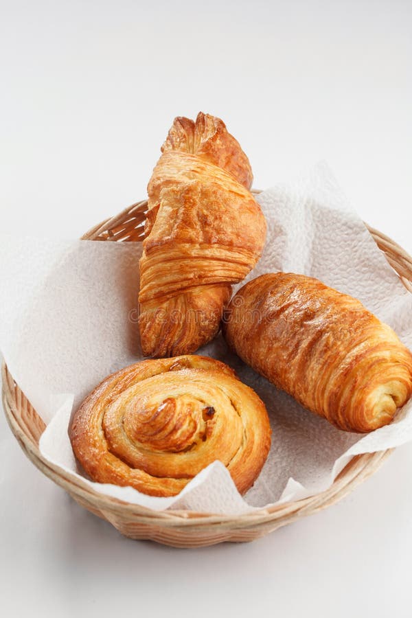 Three Pastries in the Basket Stock Photo - Image of dessert, brown ...