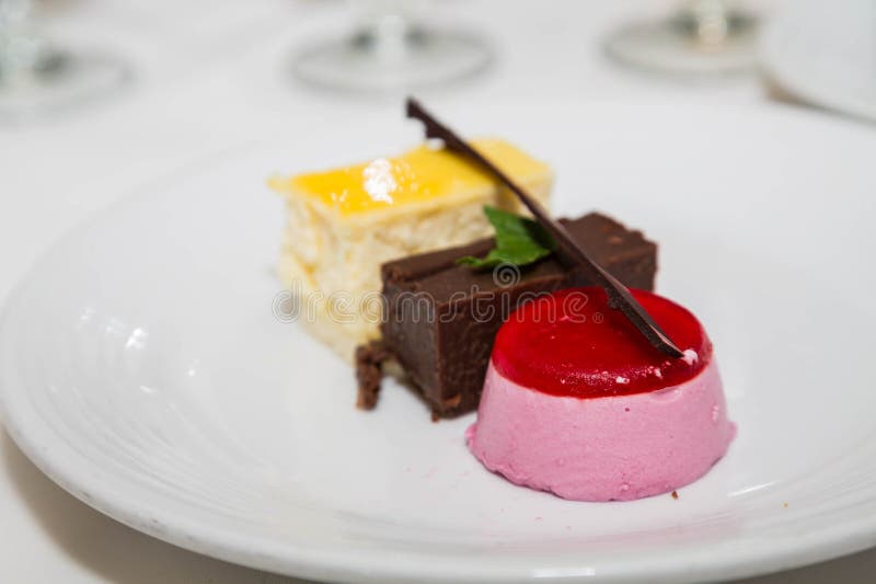 Three Pastries on White Plate Stock Image - Image of pastry, delicious ...