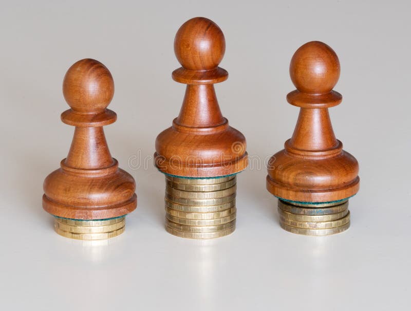 Three Pawns Chess Pieces on Columns of Coins, Symbolizing the Equality ...