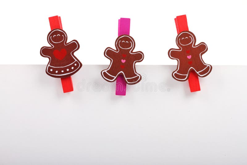 Three Pegs Attached To a Blank Paper Stock Photo - Image of message ...