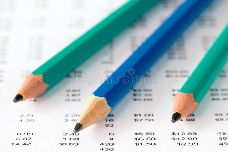 Three Pencils on a Report with Many Digits Stock Image - Image of ...