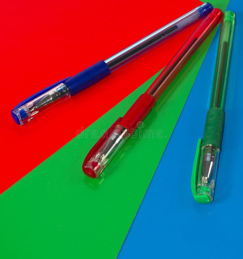 Three colored pens stock image. Image of background, three - 56779281