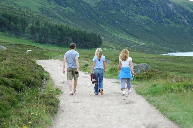 Three people stock photo. Image of threesome, coutryside - 997046