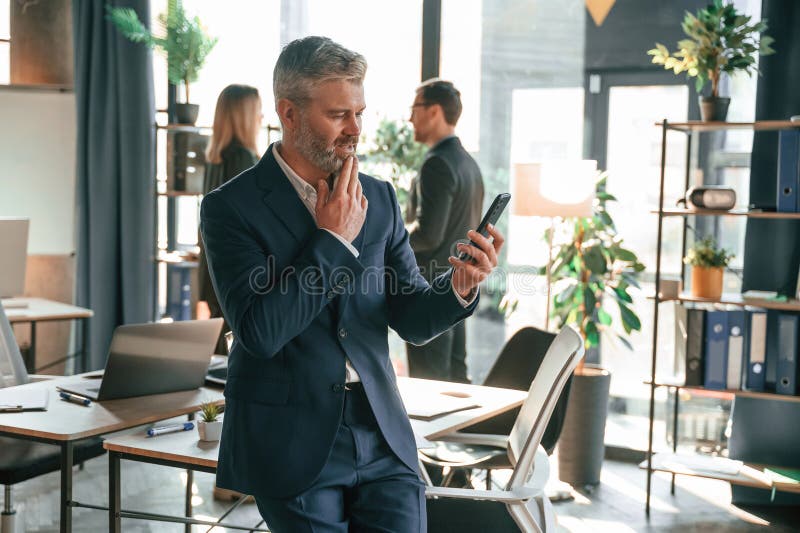 Three People are Busy in the Office. Group of Employees are Working ...