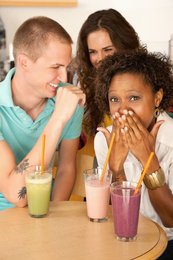 Three People Dining Out stock photo. Image of beverages - 14886540