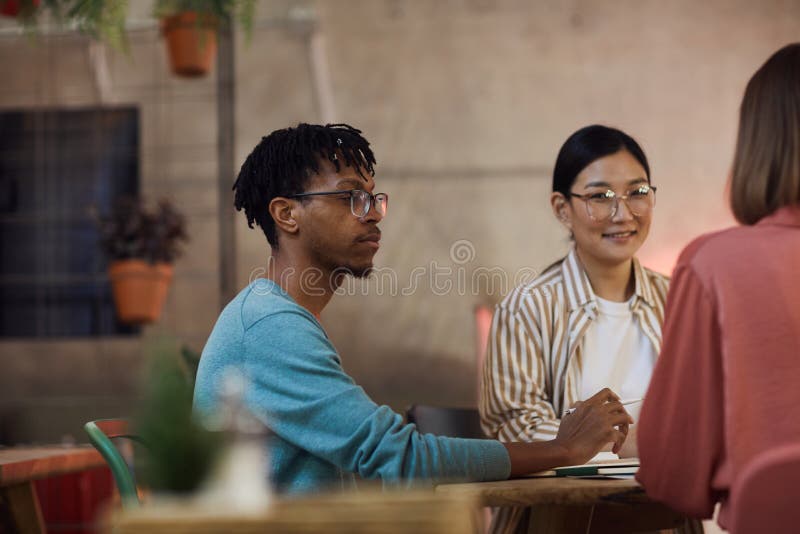 Three People Meeting in Cafe Stock Photo - Image of studying, business ...