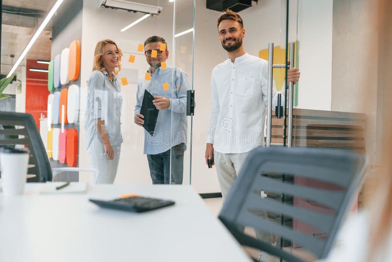 Three People Standing Together. Group of Professional Business People ...